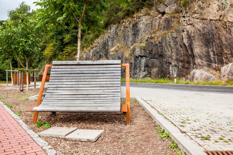 Bench next the road stock photo. Image of empty, rest - 76400970