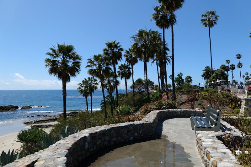 Bench Overlooking a Beautiful Ocean View Stock Photo - Image of flowers ...
