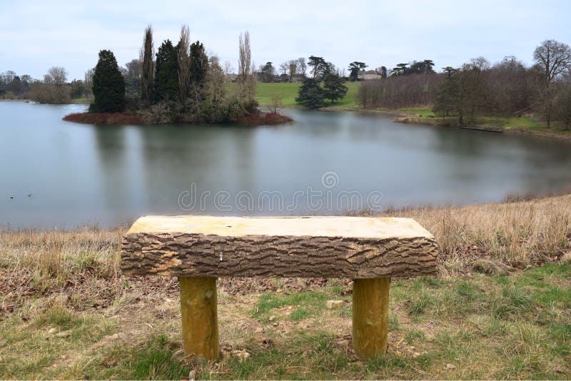 Bench overlooking a lake stock photo. Image of views - 71908434