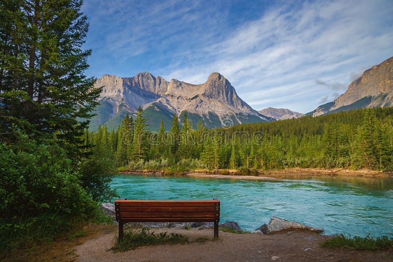 Bench Overlooking Mountains and River in Canmore Stock Image - Image of ...