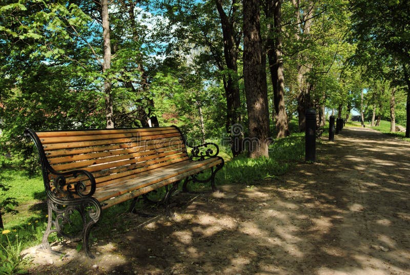 Bench in the park stock image. Image of green, season - 14651123