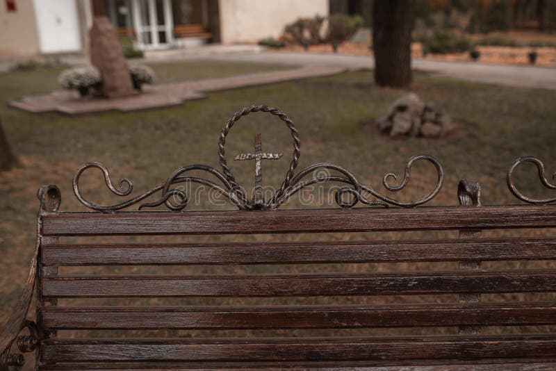 Bench in the Park at the Temple. Image of an Orthodox Cross. Stock ...