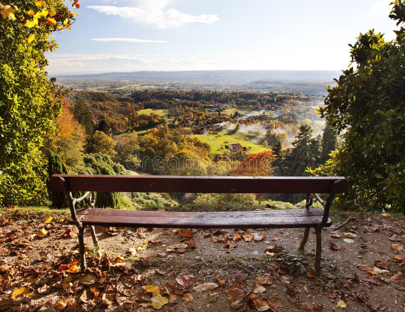 Bench in a Park with Views of the Countryside. Stock Image - Image of ...