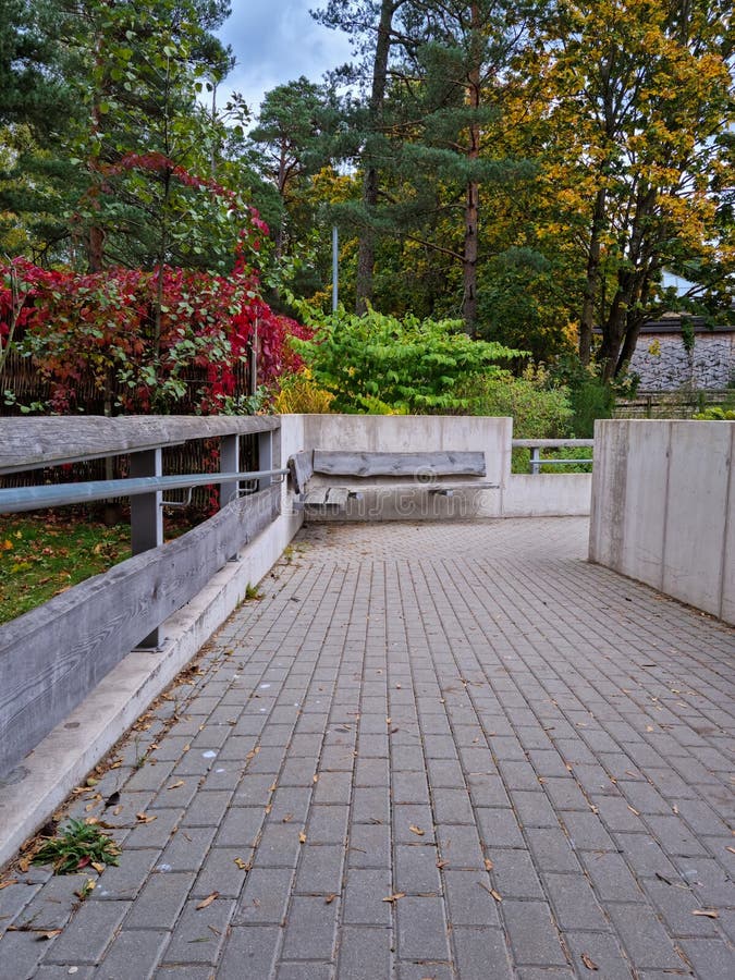 Bench at the Public Park. Modern Recreation Place. Pathway in ...