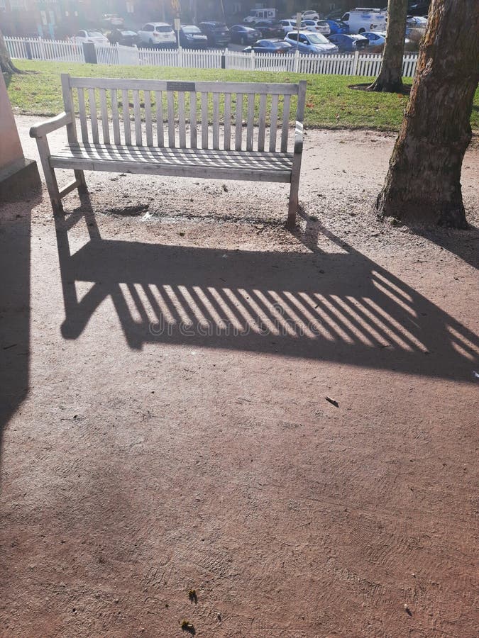 Bench and it s shadow stock photo. Image of sitting - 264213700