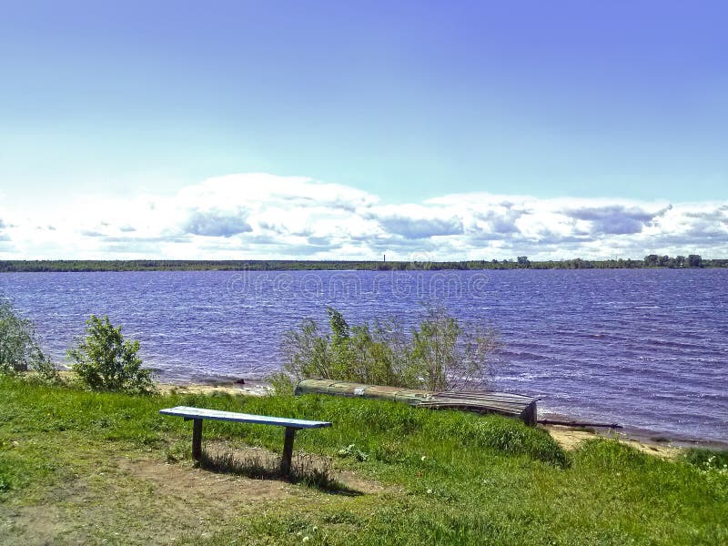 Bench on the river bank stock image. Image of landscape - 95510247