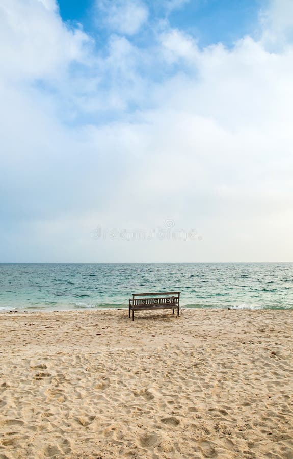 Bench on sand beach stock image. Image of travel, water - 34267871