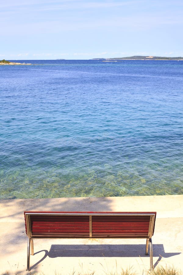 Bench by the sea stock photo. Image of shadow, seat, light - 22507840