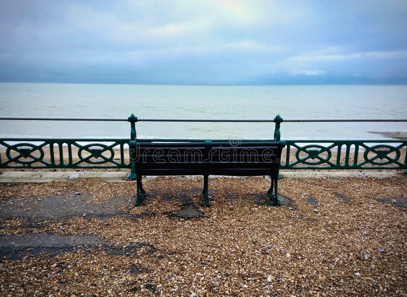A bench by the sea stock image. Image of oceanfront - 143418939