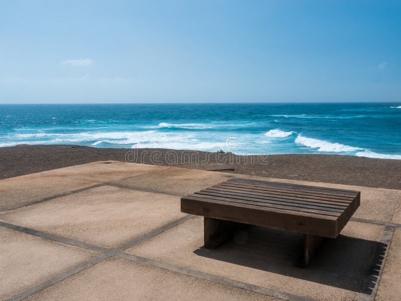Bench on the sea stock photo. Image of blue, landscape - 115606284