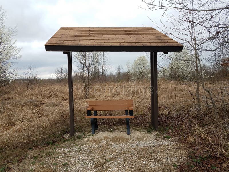 Bench or Seat with Covered Roof and Brown Grass Stock Photo - Image of ...