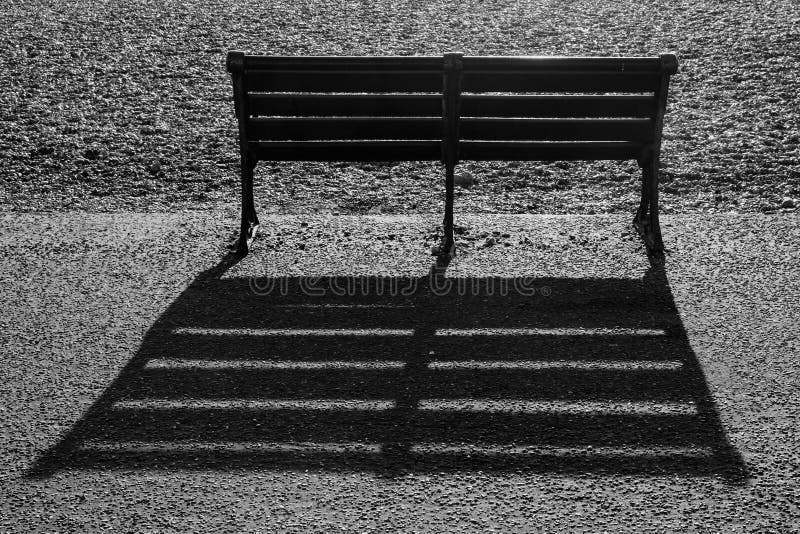A Bench and Shadow stock photo. Image of coastal, nature - 139847012