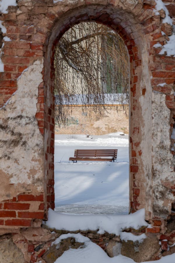 Bench in the Snow through an Arched Window Stock Photo - Image of house ...