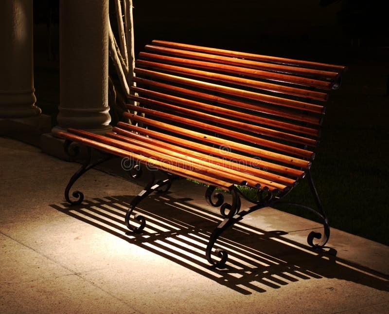 Bench in Spotlight stock photo. Image of perch, bole - 12609452