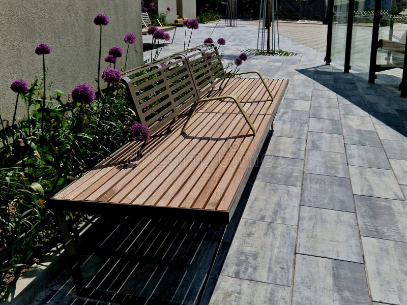 A Bench in the Square or by the Station. the Bench is Divided into ...