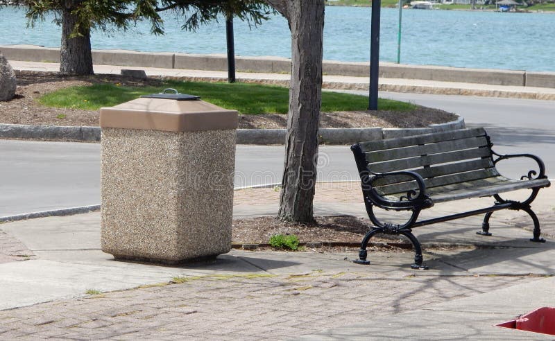 Bench and Stone Trash Receptacle Stock Image - Image of walk ...