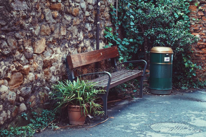 Bench in the street stock image. Image of empty, street - 139195797