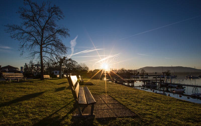 Bench and Sunrise stock image. Image of scenery, switzerland - 31117007