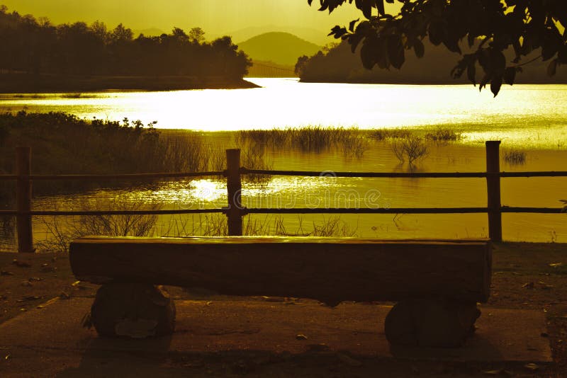 Bench during a sunset stock photo. Image of dusk, tranquil - 38227256