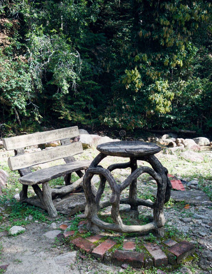 A Bench and a Table on Riverside Stock Image - Image of hard ...