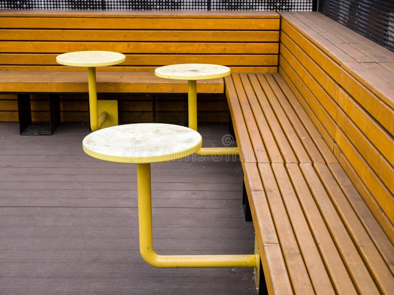 Bench with Tables Fixed on the Console Stock Image - Image of small ...