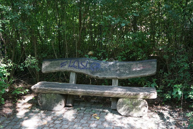 Bench by the Trail in a Recreation Area in Berlin. Berlin, Germany ...