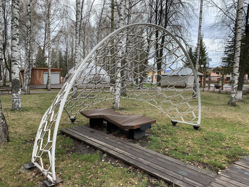 Bench under the arch stock photo. Image of beautiful - 220011194