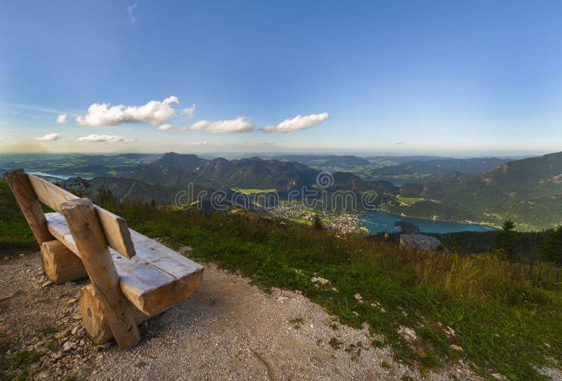 Bench under the skies stock image. Image of wooden, mountains - 67654953