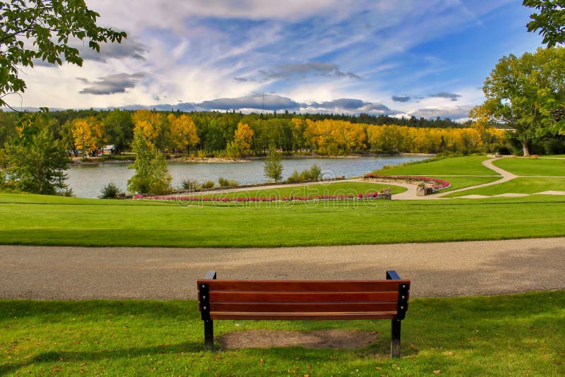 Bench View Overlooking the Bow River Stock Image - Image of park ...