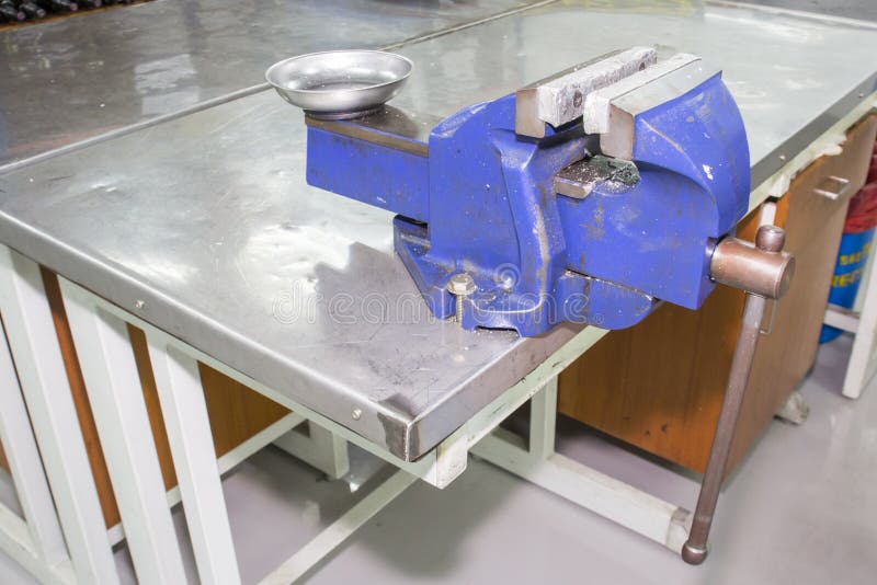 Bench vise on table stock photo. Image of bench, industry - 33948000
