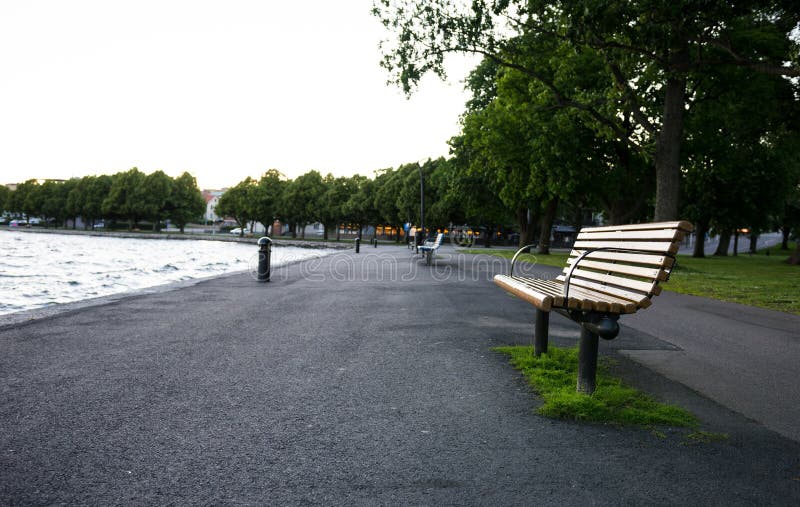 Bench by the water stock image. Image of outdoor, path - 20788015