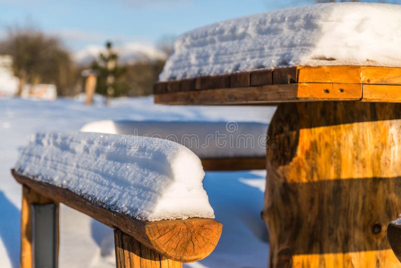 Bench in Winter Covered with Snow in a Winter Sunny Day Stock Photo ...