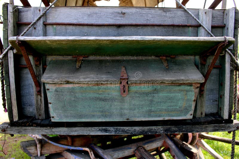 Bench and Wooden Storage Box on Covered Wagon Stock Photo - Image of ...