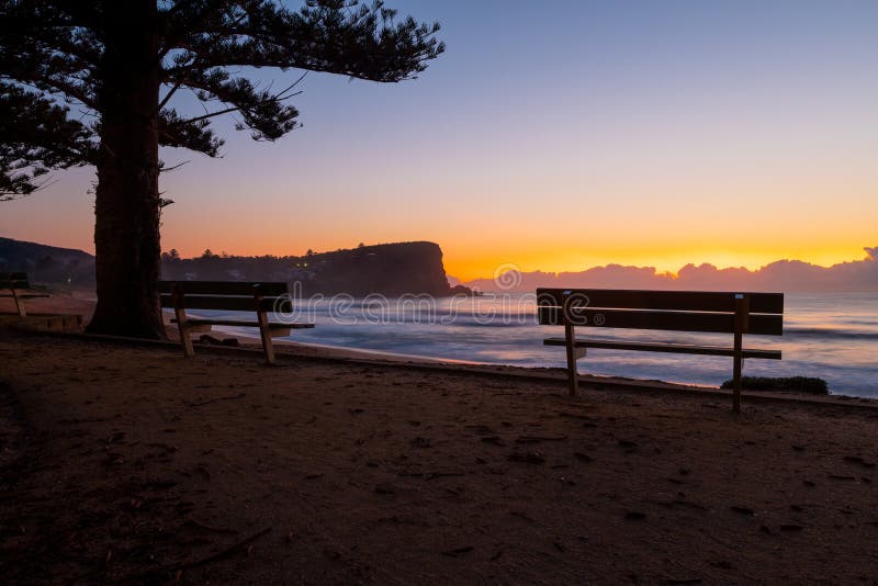 Bench Seats Silhouetted at Scenic Avalon Beach at Dawn Stock Photo ...