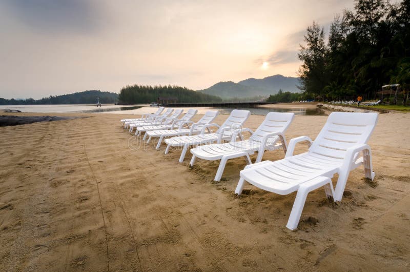 Benches at beach stock image. Image of resting, shezlong - 66048391