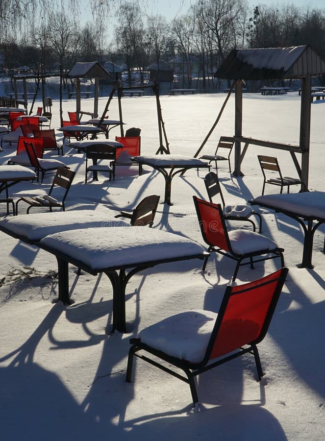 Benches-covered benches stock photo. Image of sunny - 200338900