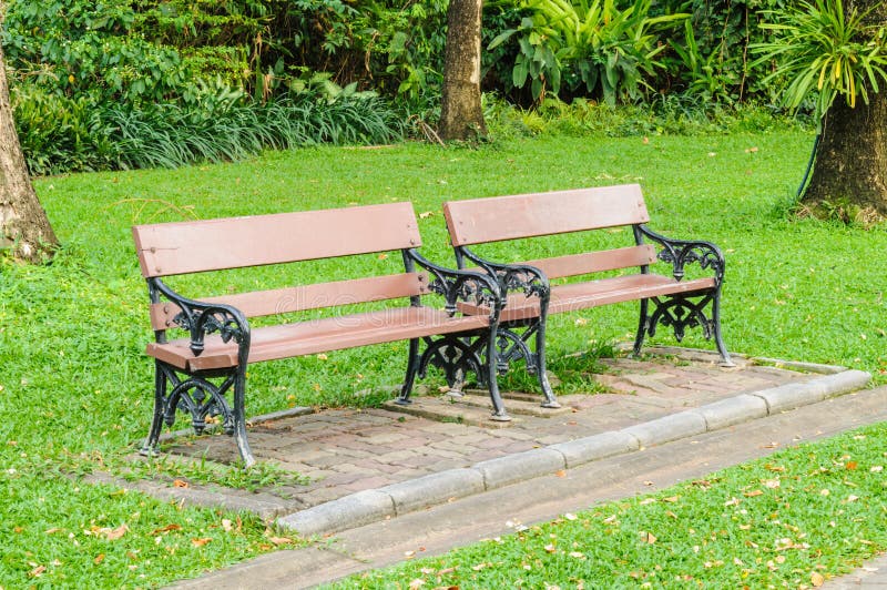 Bench in the park stock image. Image of plant, garden - 24701619