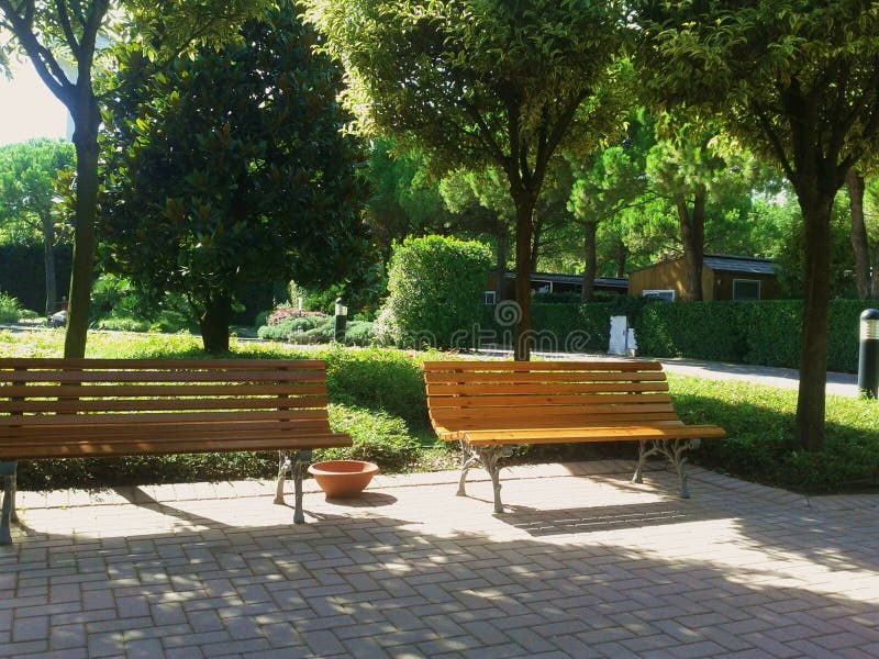 Benches in the park, Italy stock photo. Image of summer - 70144622