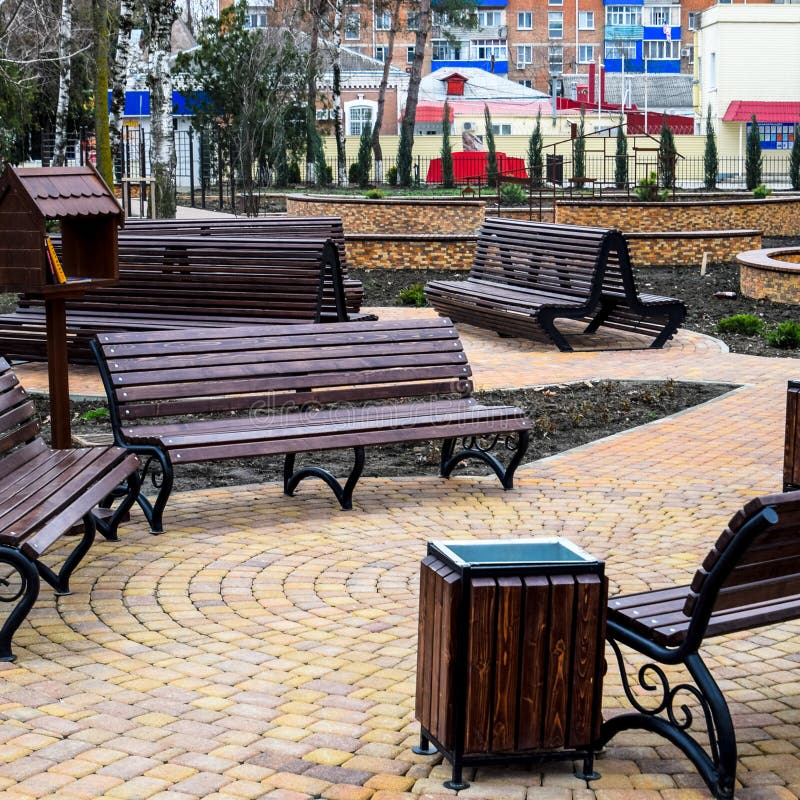 Benches in the Park. Sidewalk Tile in the Park Stock Photo - Image of ...