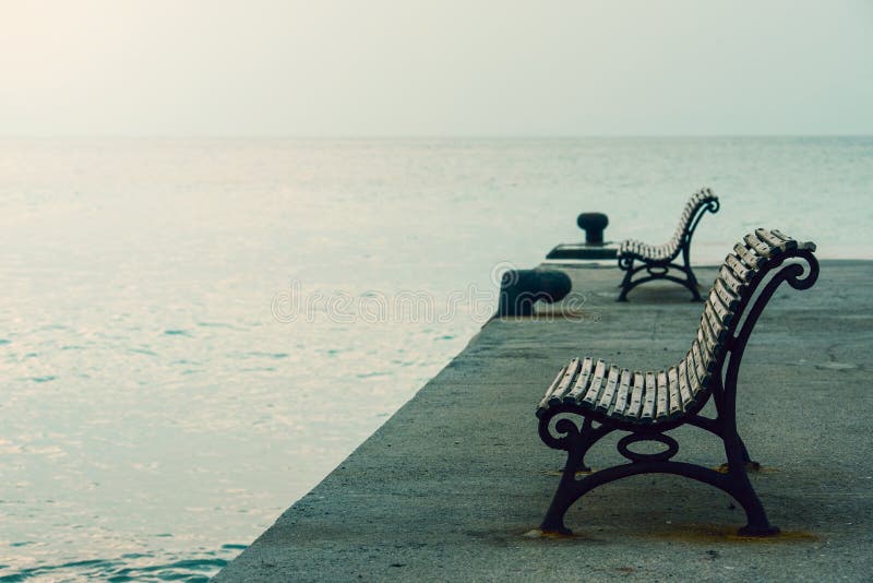 Benches on the sea coast stock photo. Image of nature - 92747974
