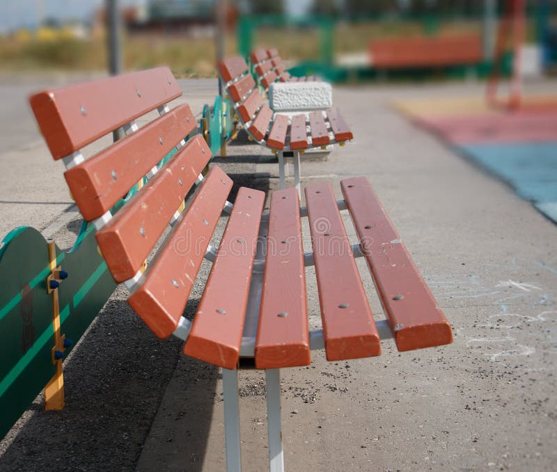 Benches Stand in a Row in the Park Stock Photo - Image of bench ...