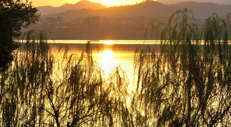 A bend in a golden sunset stock photo. Image of autumn - 163919710