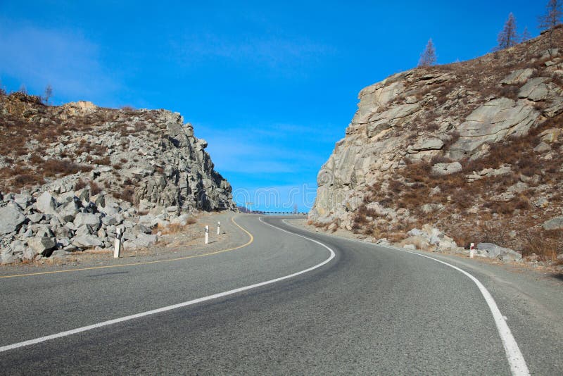 Bend in the road stock photo. Image of high, hill, pass - 18766046