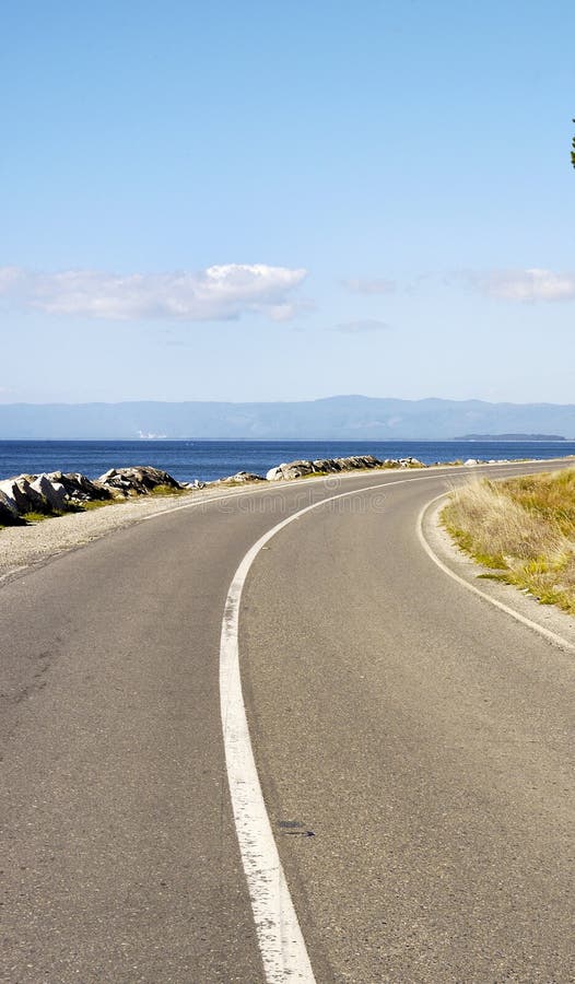 Bend in the road stock photo. Image of seaside, line - 46979822