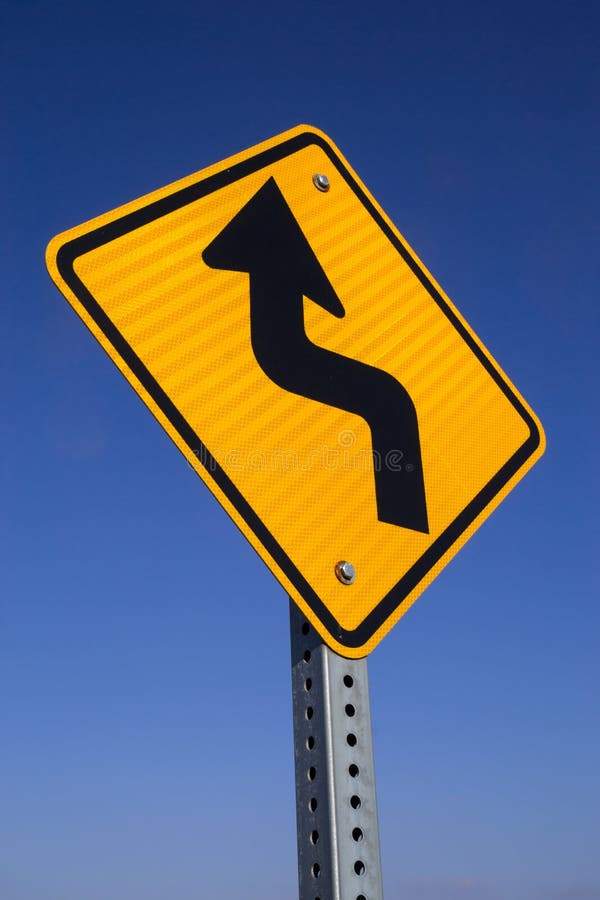 Bend in road sign. stock photo. Image of reflective, roadsign - 49807638