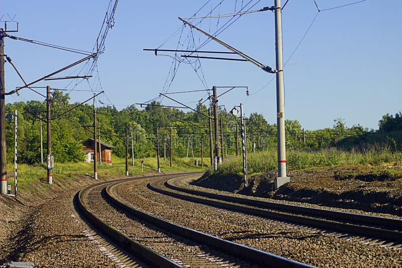 A Section of an Electrified Railway Stock Image - Image of greens, iron ...
