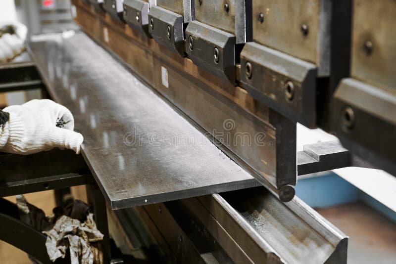 Bending Machine Operates with Heavy Metal Plate in Shop Stock Photo ...