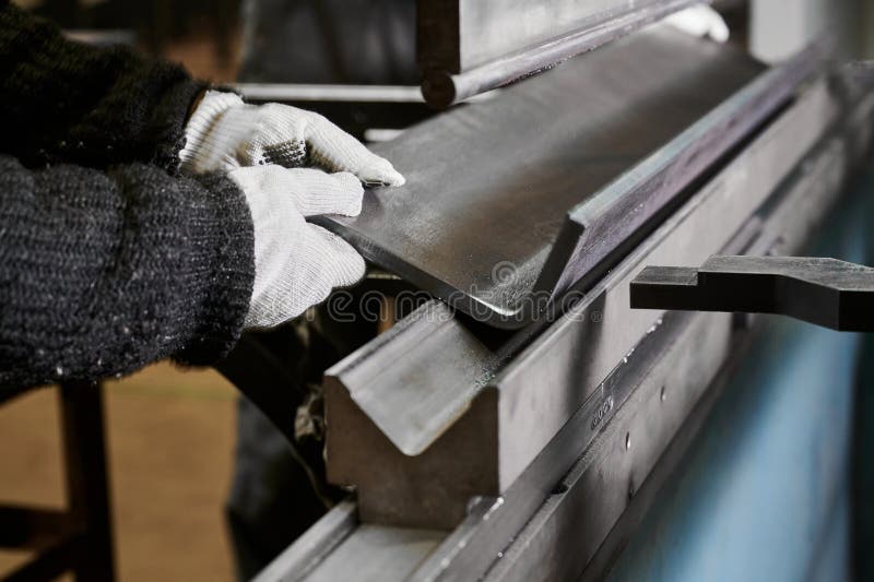 Bending Press Operates with Metal Sheet in Plant Workshop Stock Image ...