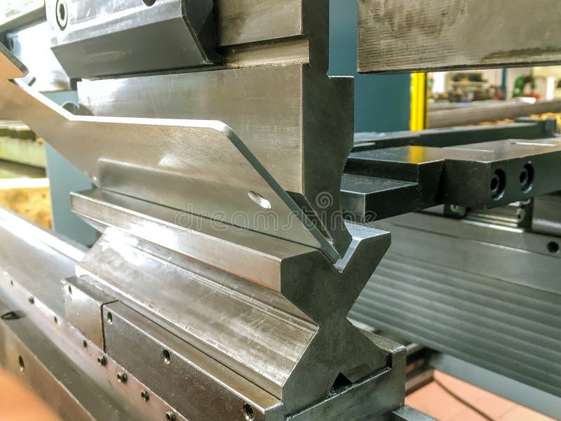 Bending Sheet Metal with a Hydraulic Machine at the Factory Stock Photo ...