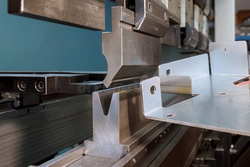 Bending Sheet Metal with a Hydraulic Machine at the Factory Stock Photo ...